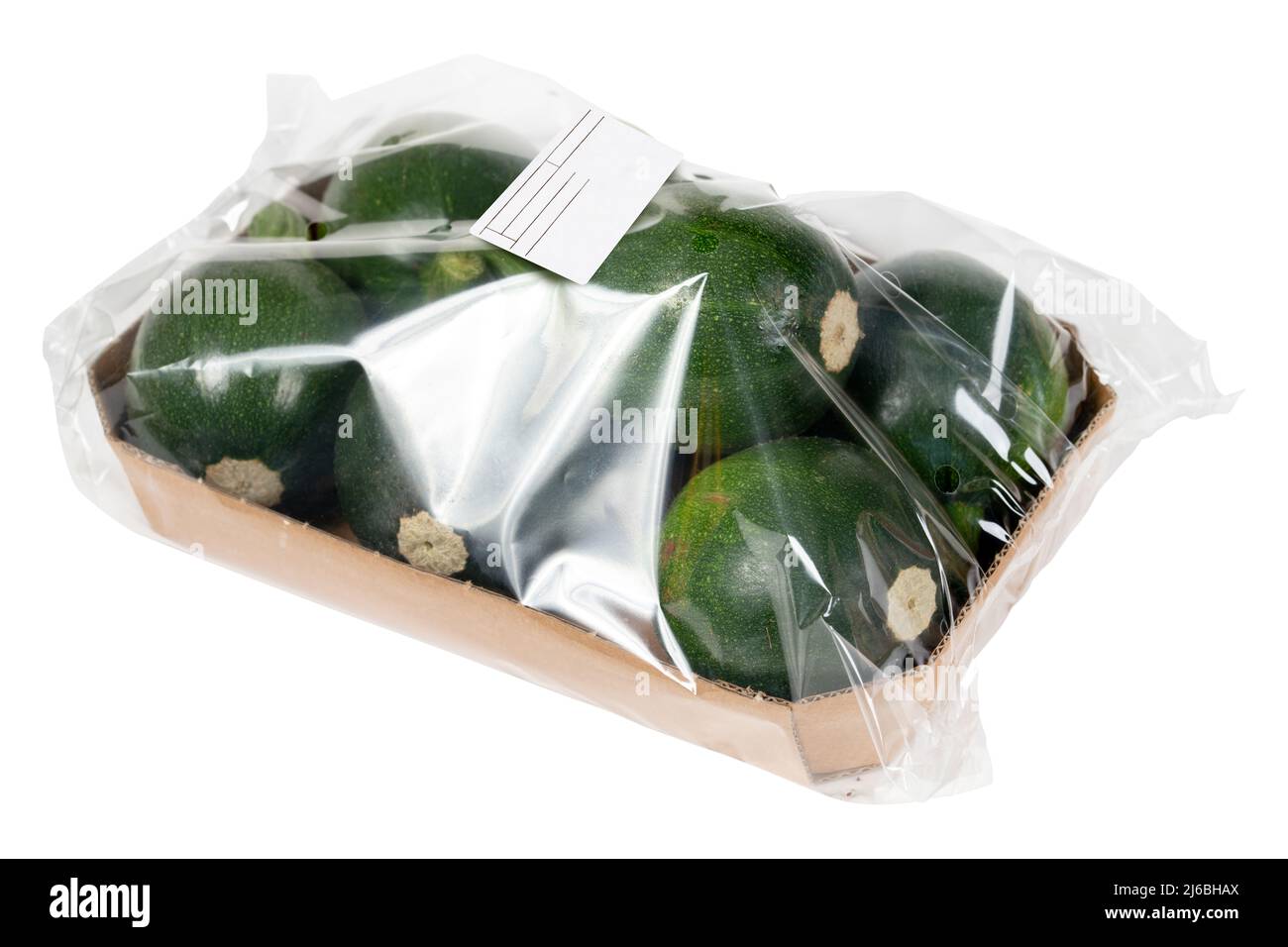 Packed and labeled round zucchini on an isolated white background Stock ...