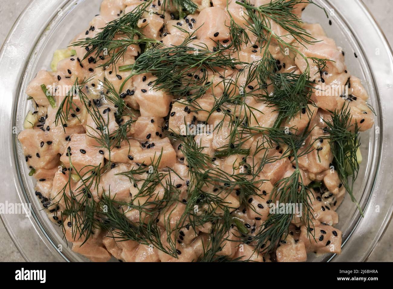 Ceviche salmon with black sesame and dill Stock Photo - Alamy