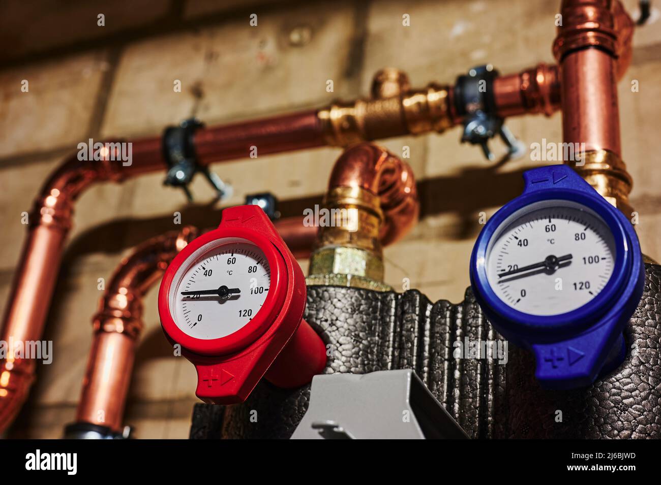 Heating system under construction with a view to the thermometers of ...