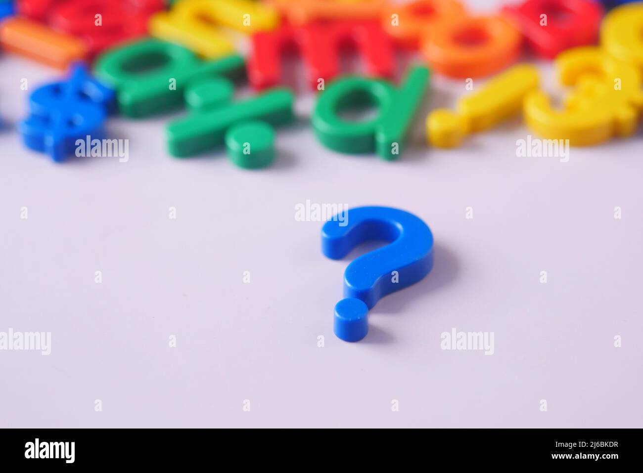 question mark on a pink background with copy space Stock Photo - Alamy