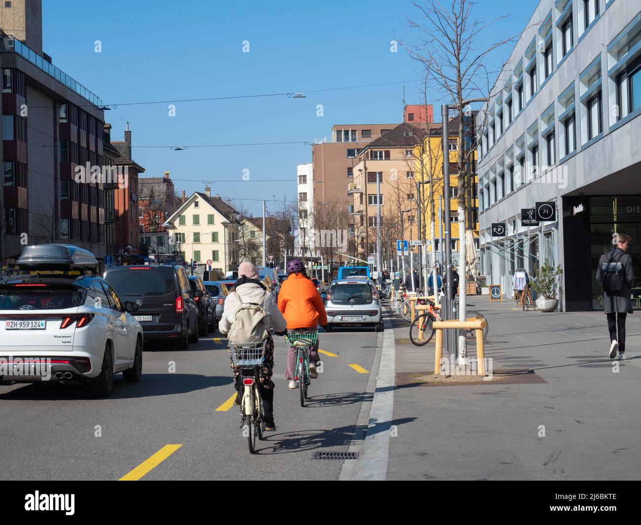Car overtaking a bike hi-res stock photography and images - Alamy