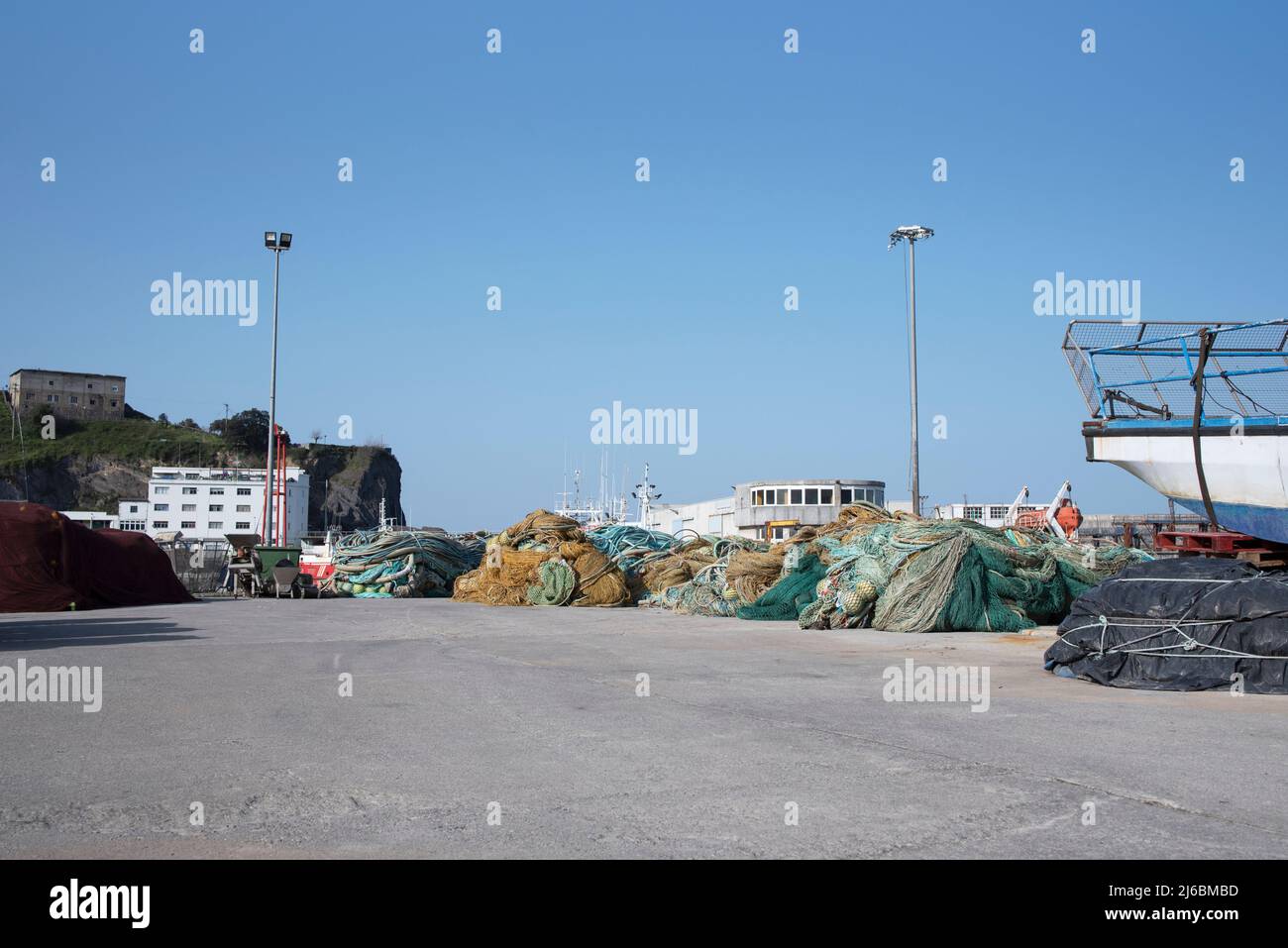 fishing nets thrown in the harbor Stock Photo - Alamy