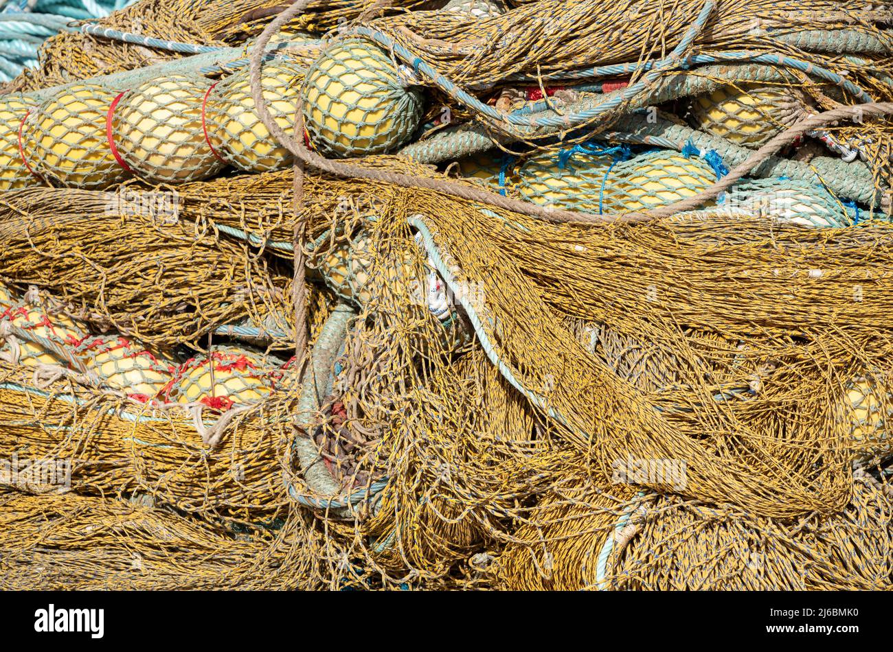 fishing nets thrown in the harbor Stock Photo - Alamy