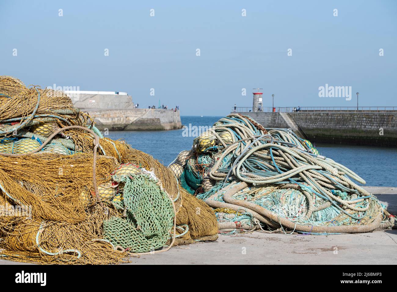 fishing nets thrown in the harbor Stock Photo - Alamy