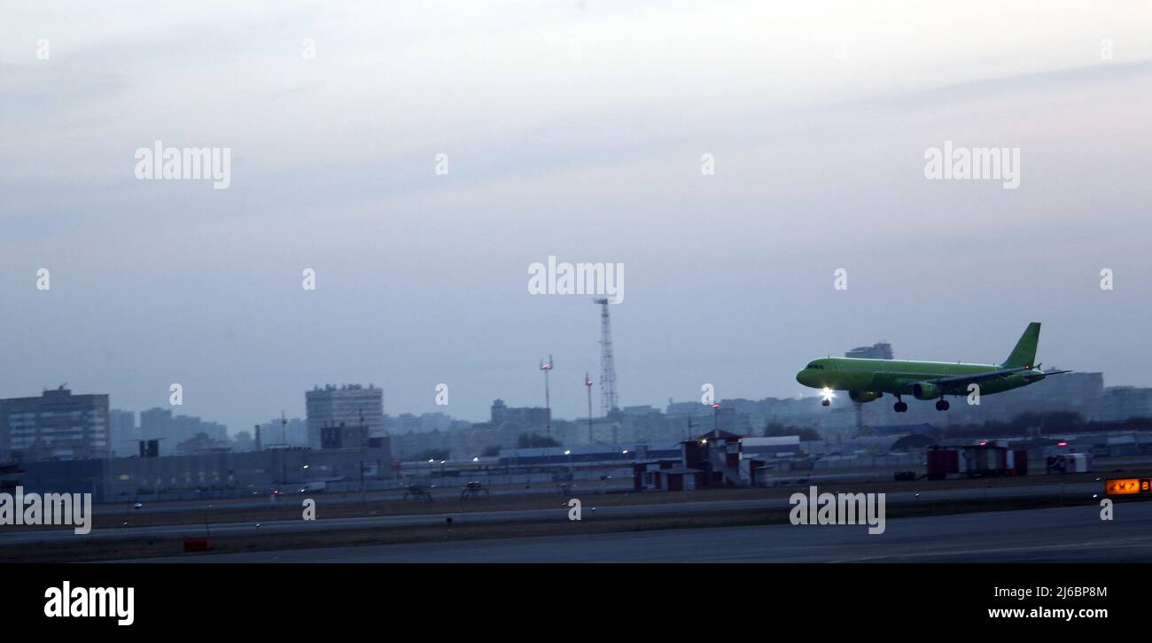 Passenger plane takes off from the airport runway. Side-view of aircraft. Horizontal image Stock ...