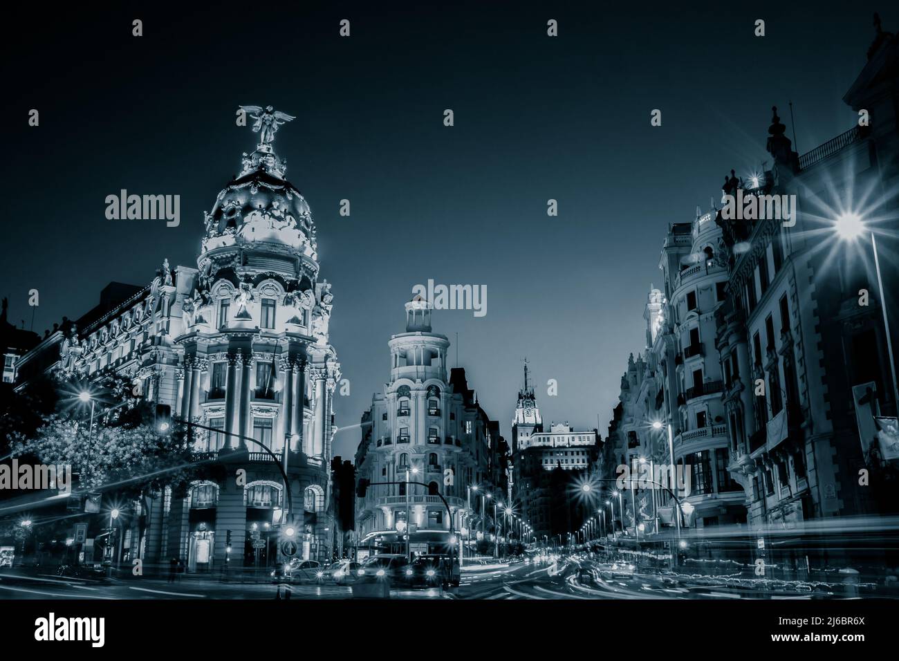 Rays of traffic lights on Gran via street, main shopping street in ...