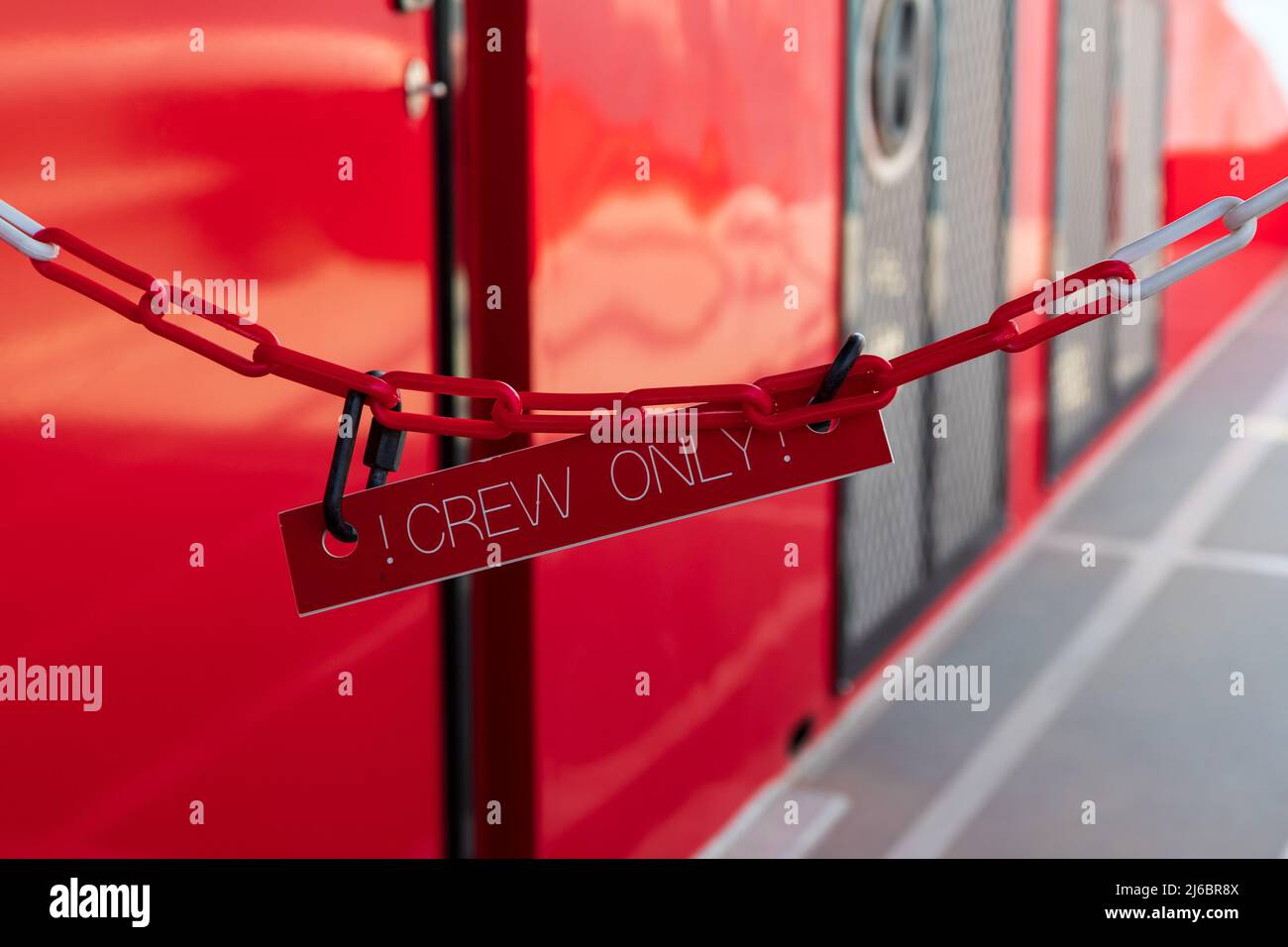 Red Crew Only sign Stock Photo - Alamy