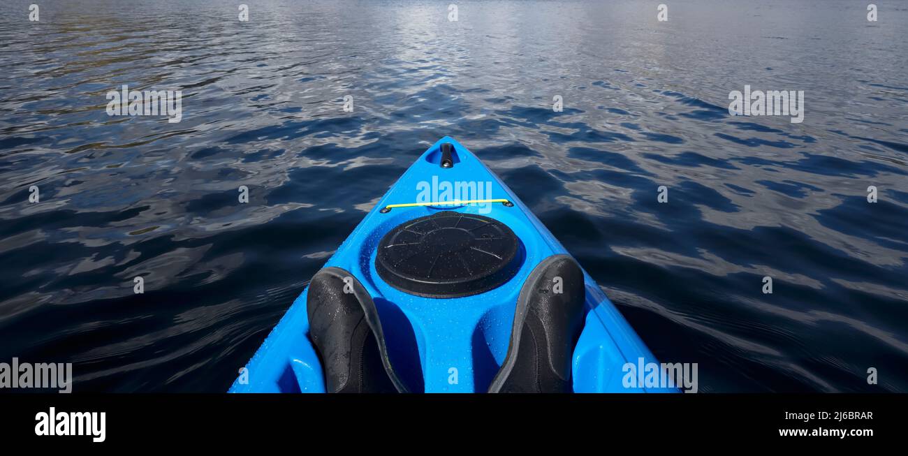 Blue kayak on open water at Loch Lomond Stock Photo - Alamy