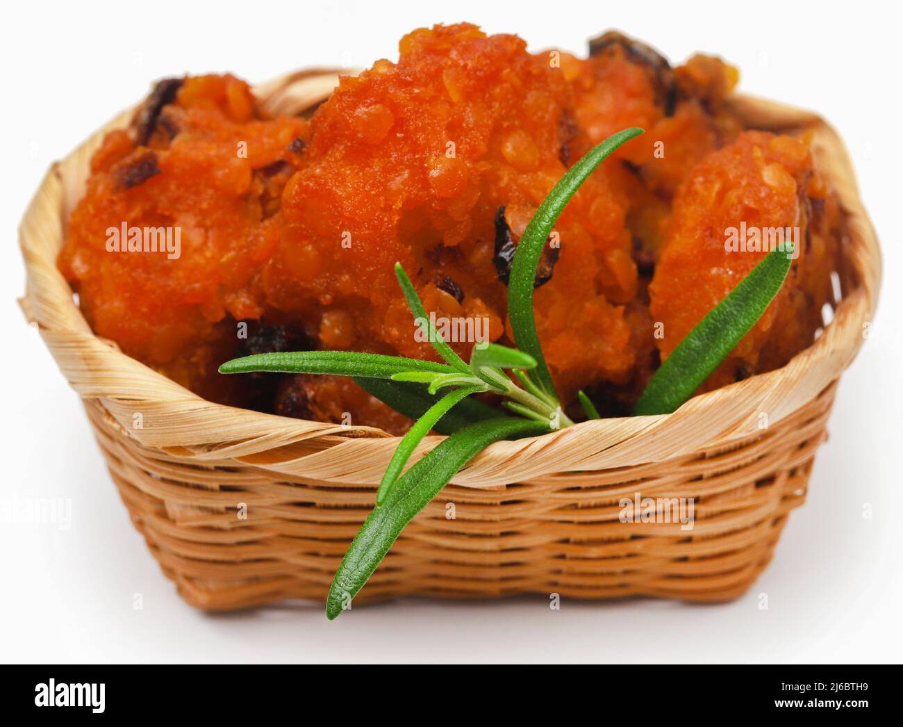 Southeast Asian snack of pulse and onion called Piaju with rosemary ...