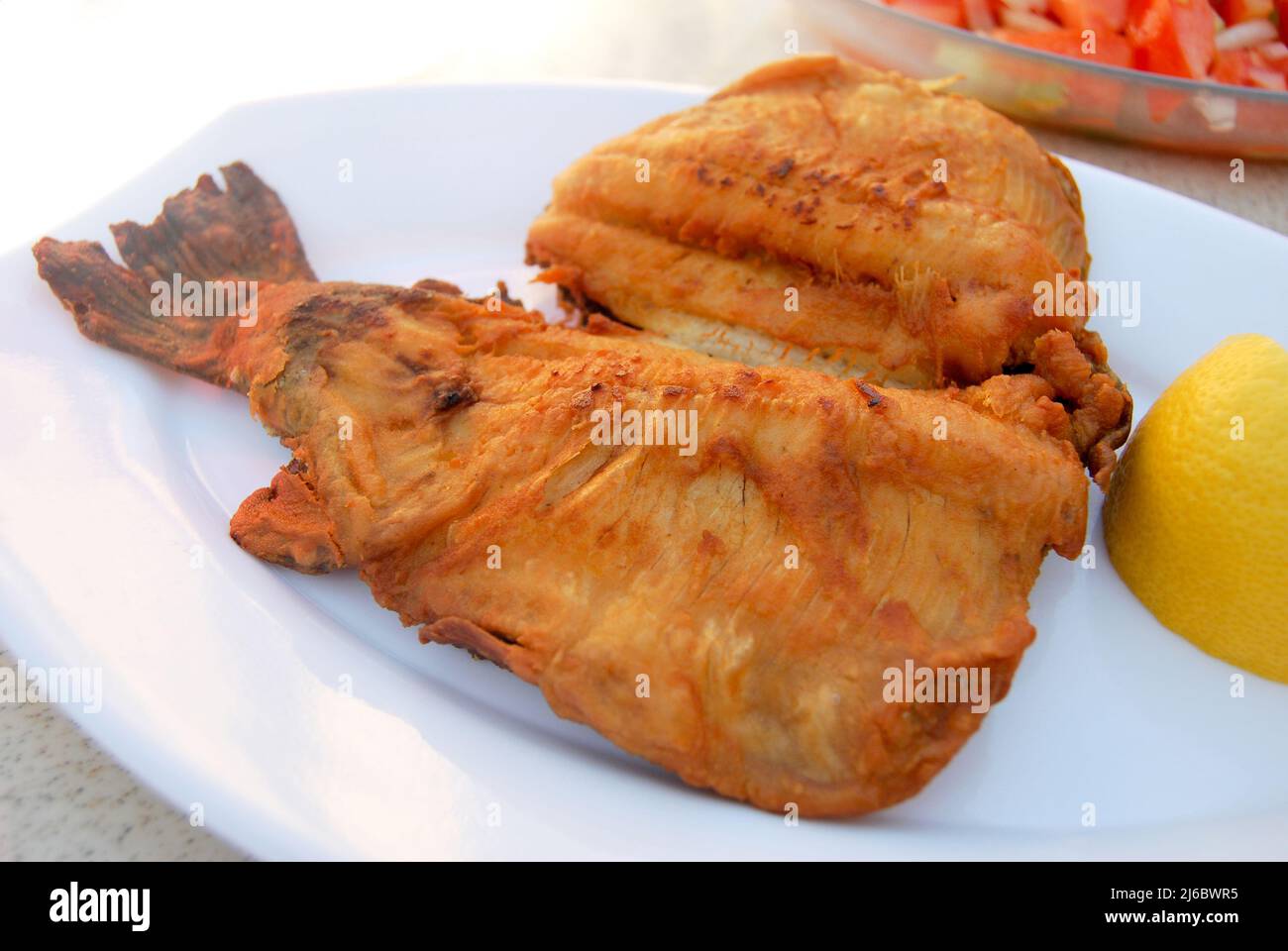 Delicious and beautiful fried trout fish, in a white dinner plate Stock ...