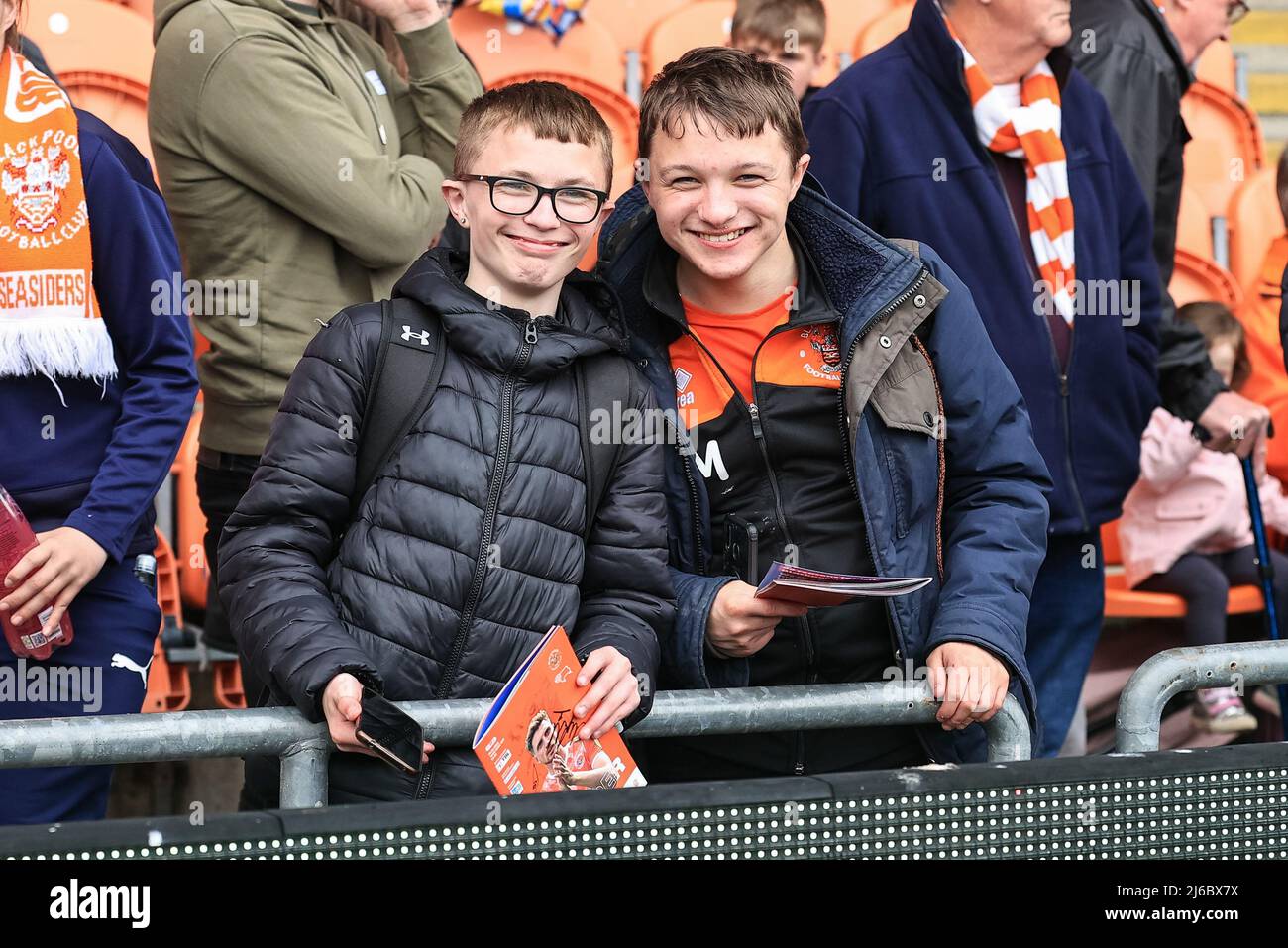 Blackpool fans attending the game Stock Photo - Alamy