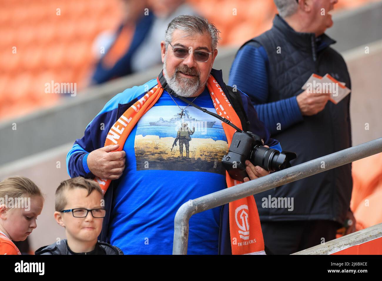 Blackpool fans attending the game Stock Photo - Alamy