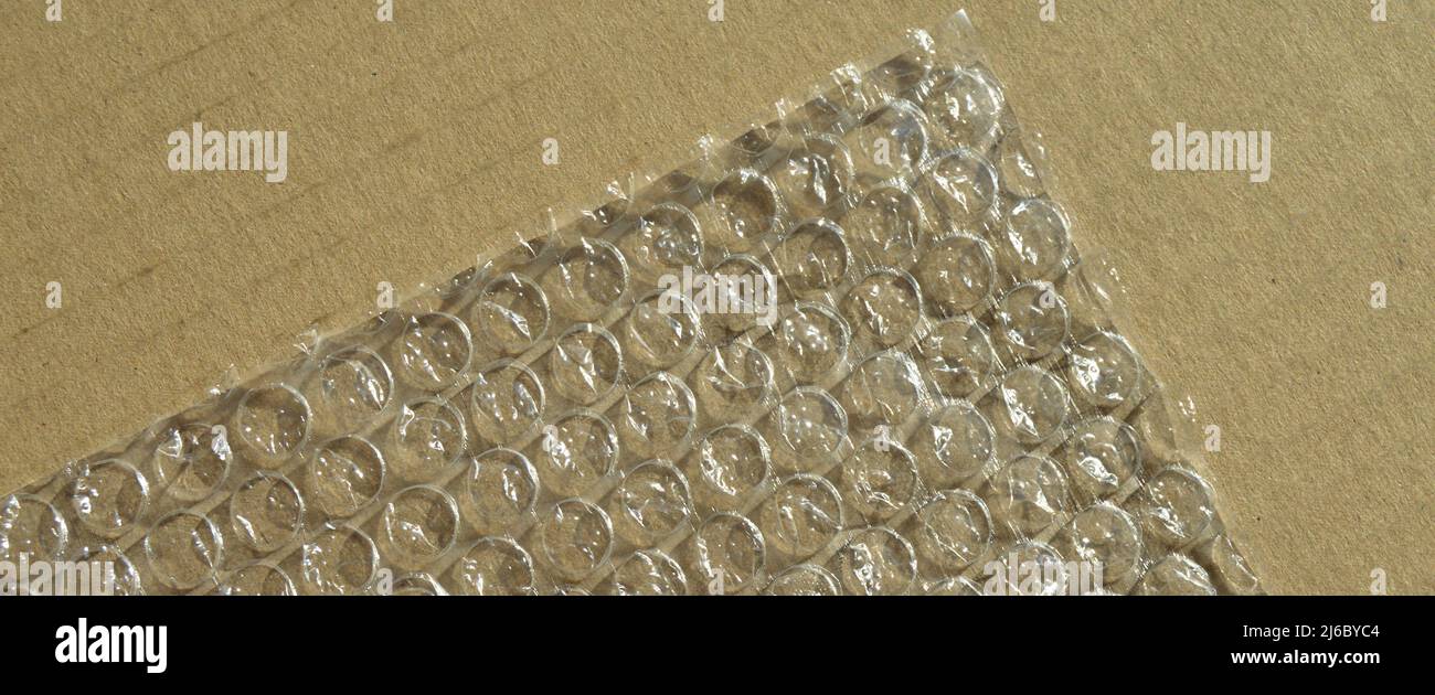 On corrugated cardboard paper plastic air bubble protection foil wrap ...