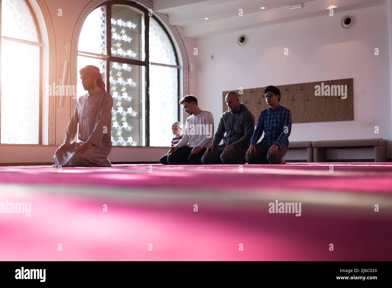 Prayer with a thankful heart. Group of muliethnic religious muslim ...