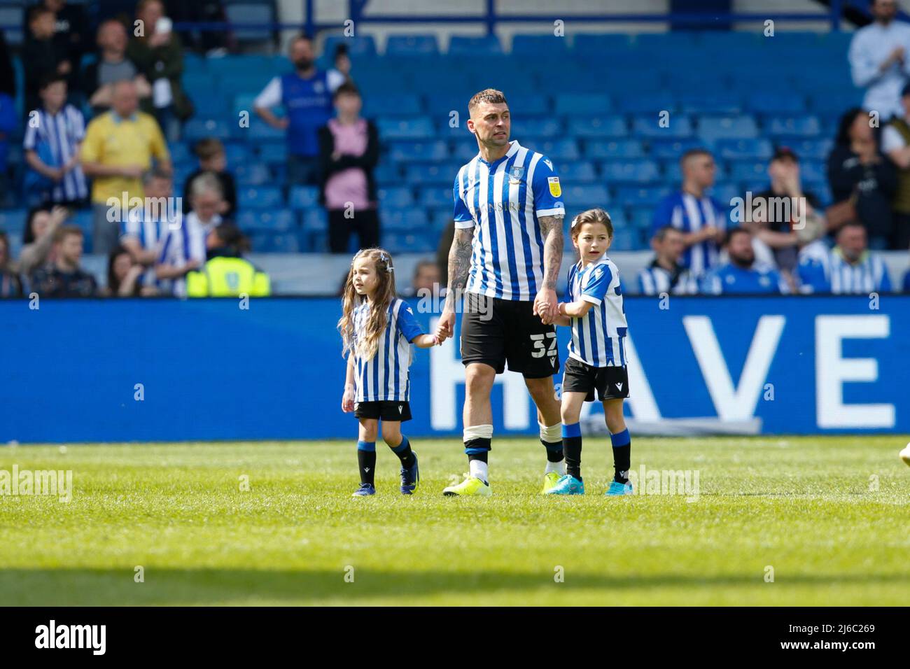 Jack Hunt #32 of Sheffield Wednesday does a lap of honour with his ...