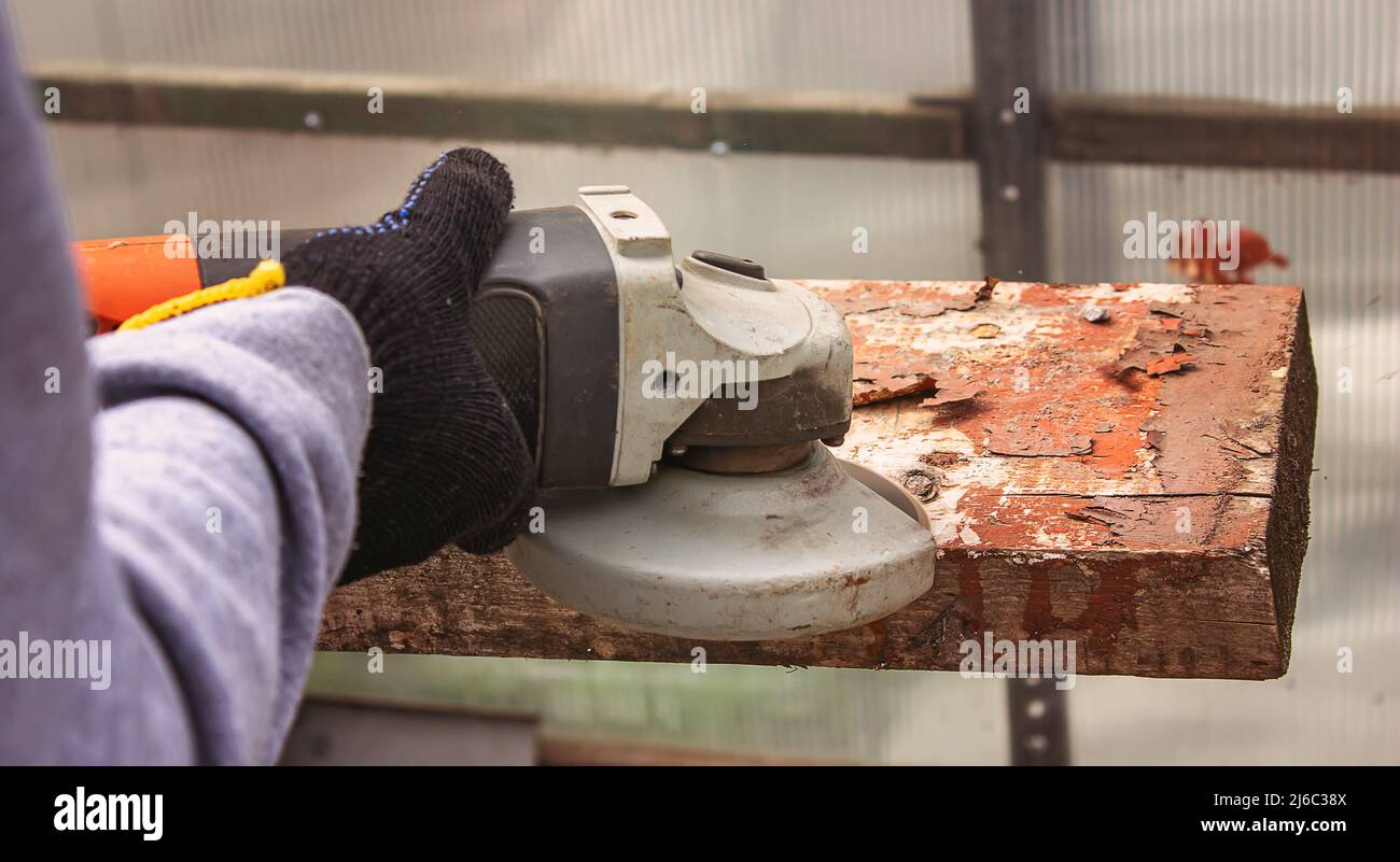 Worker removing wooden boards hi-res stock photography and images - Alamy