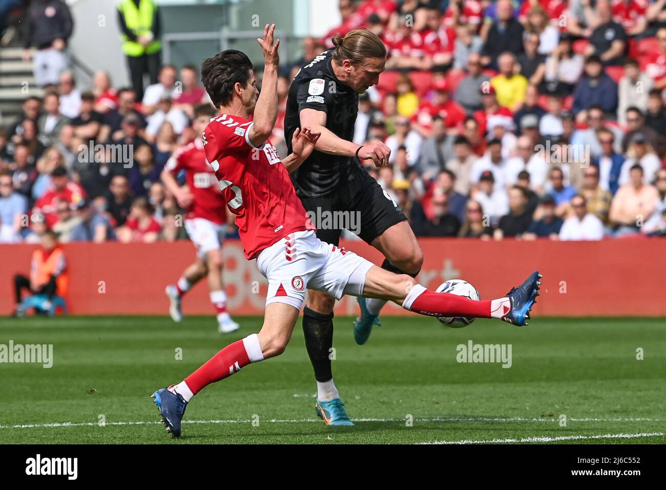 Tom Eaves #9 of Hull City shoots on goal but its blocked by Timm Klose ...
