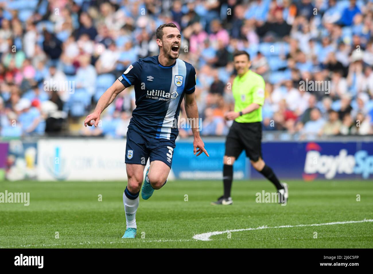 Harry Toffolo #3 of Huddersfield Town celebrates scoring a goal to make ...