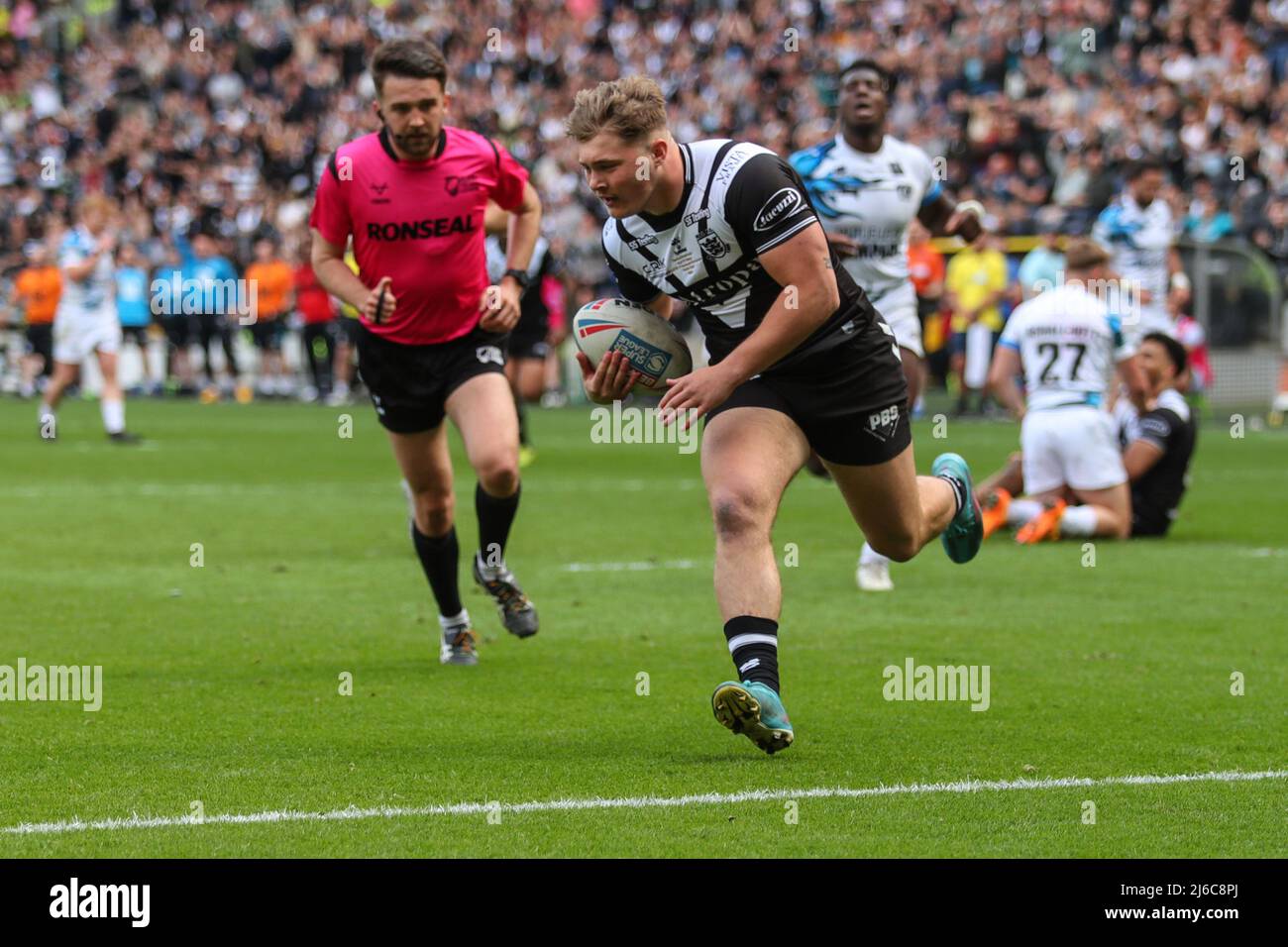 Denive Balmforth #33 of Hull FC runs in to score his debut try after ...