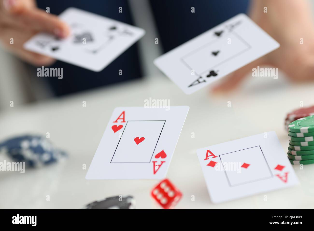 Throwing playing cards hi-res stock photography and images - Alamy