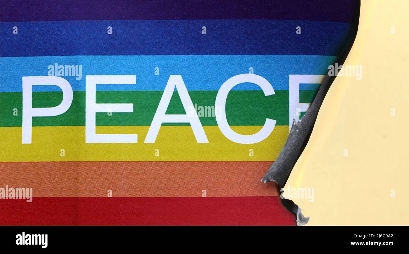 peace flag with the colors of the rainbow and the big text while ...