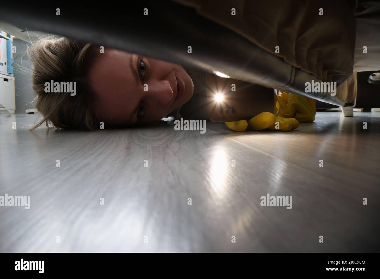 Girl look under bed hi-res stock photography and images - Alamy