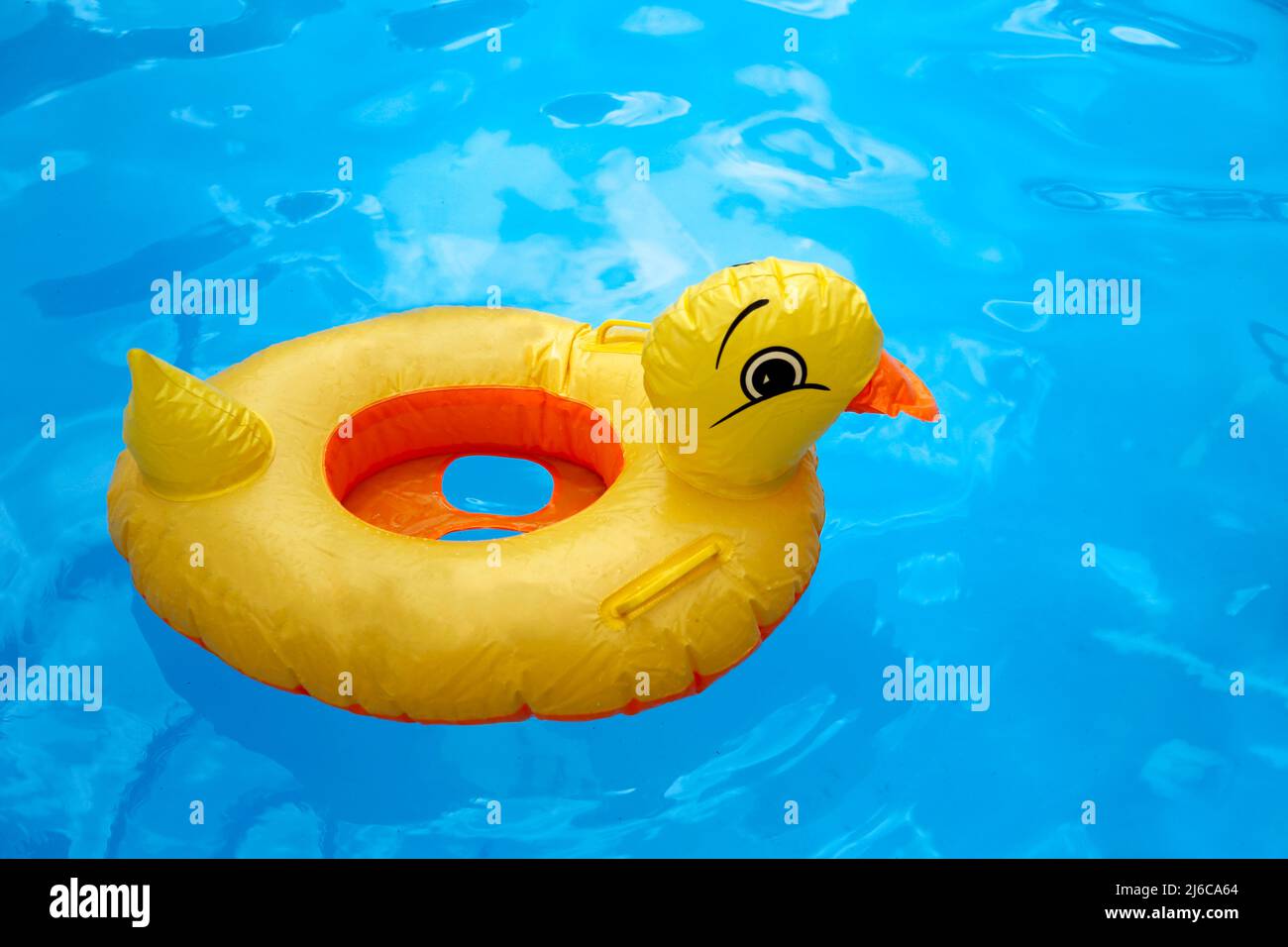 Yellow inflatable pool toy hi-res stock photography and images - Alamy