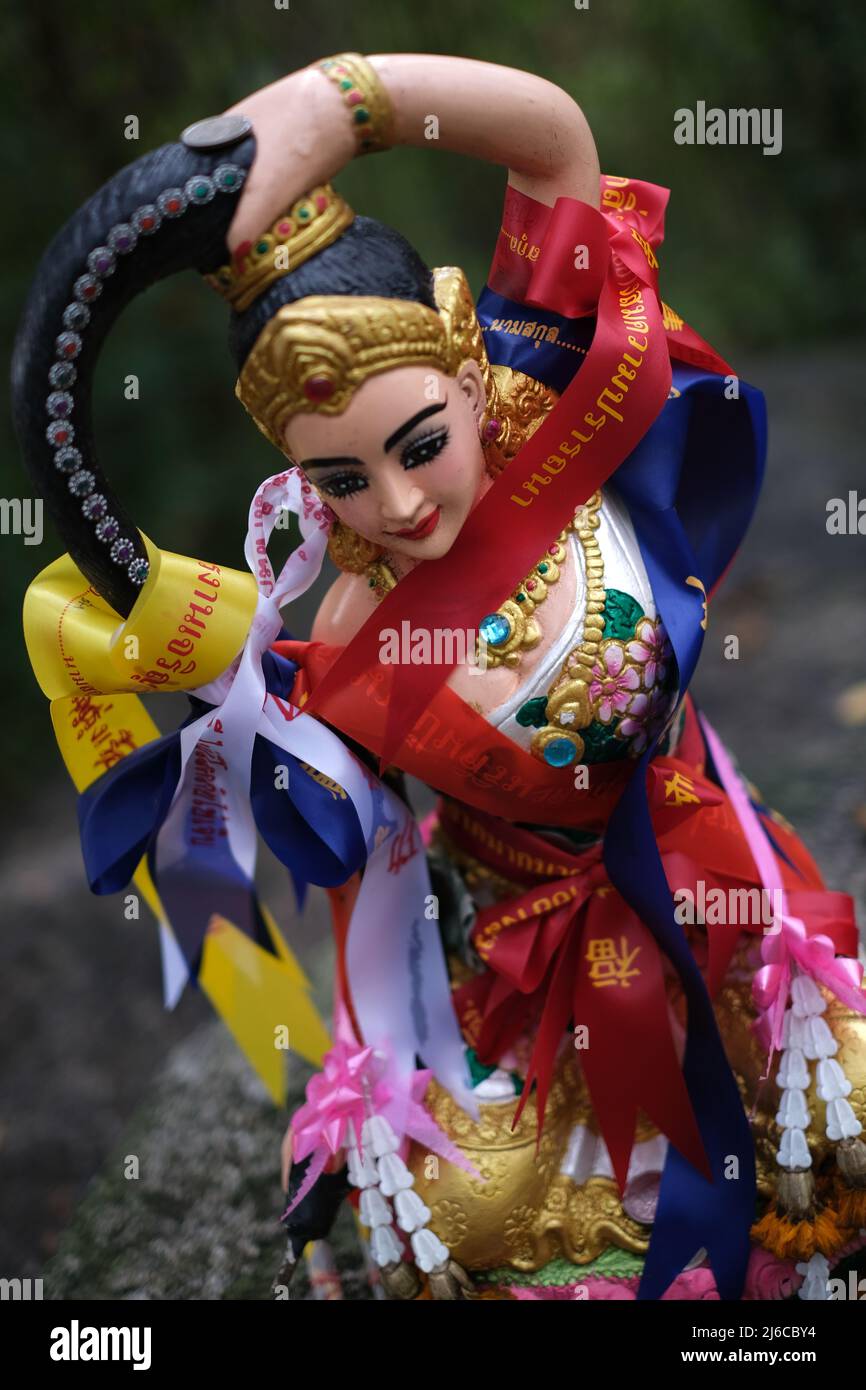A figurine of Phra Mae Thorani: Buddhist goddess Stock Photo - Alamy