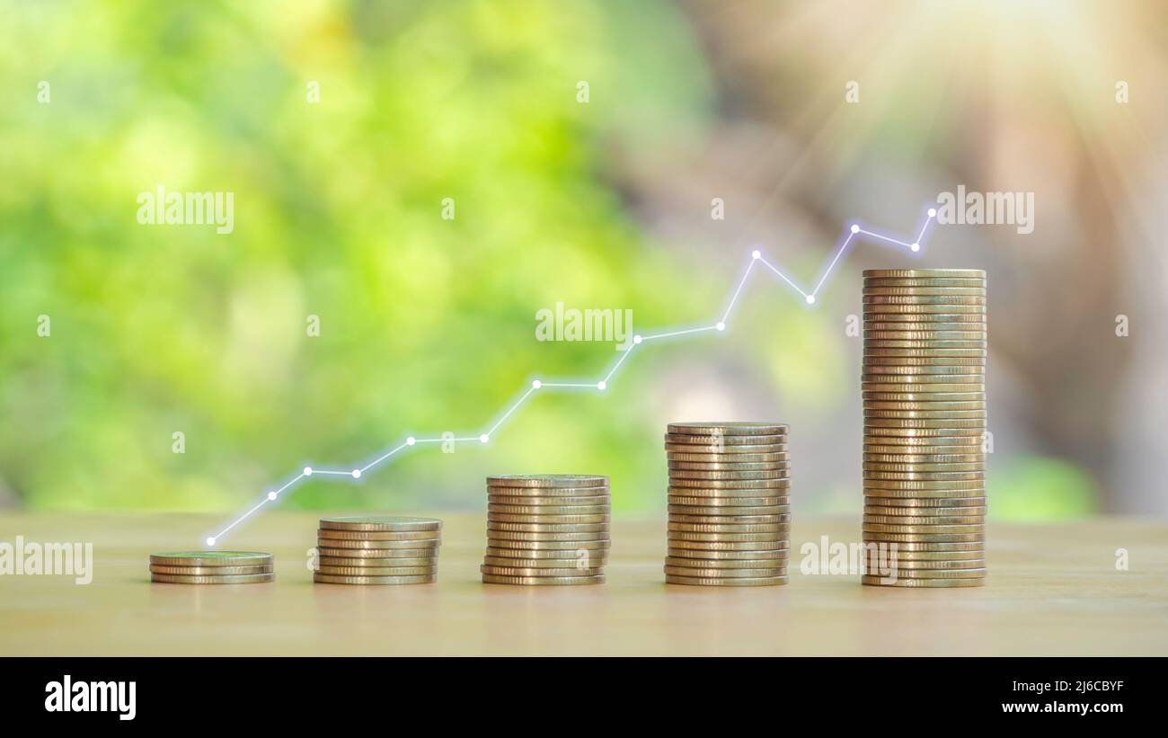 Stock funding or money saving graph with golden coins to save the money ...