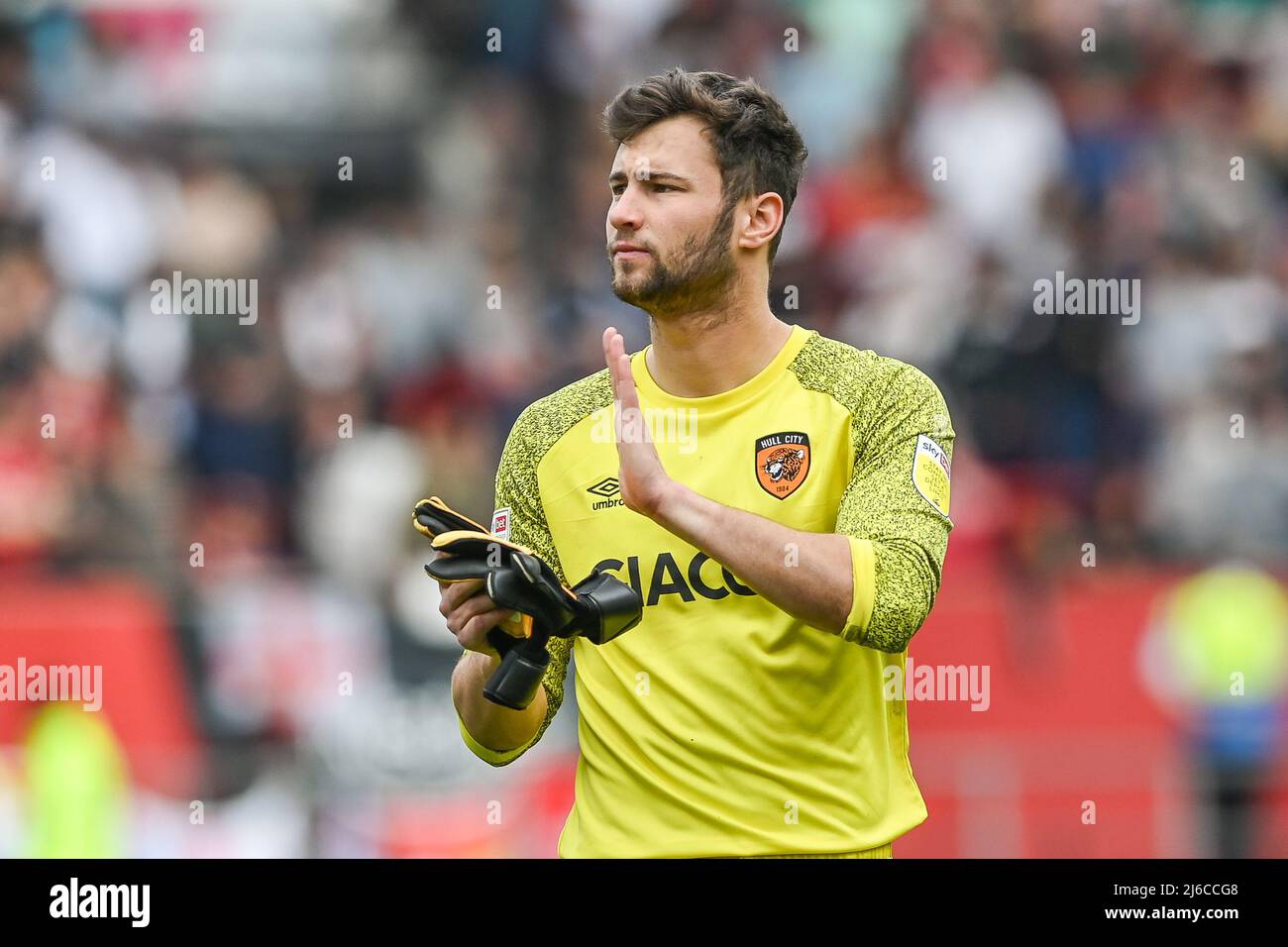 Nathan Baxter #13 of Hull City applauds the fans at the end of the game ...