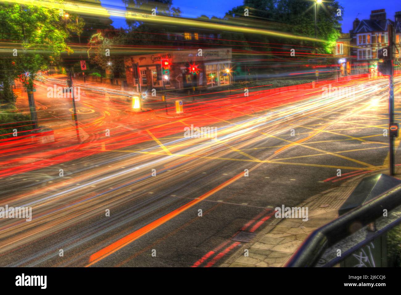 Slow shutter multiple exposure of traffic light trails on Archway Road ...
