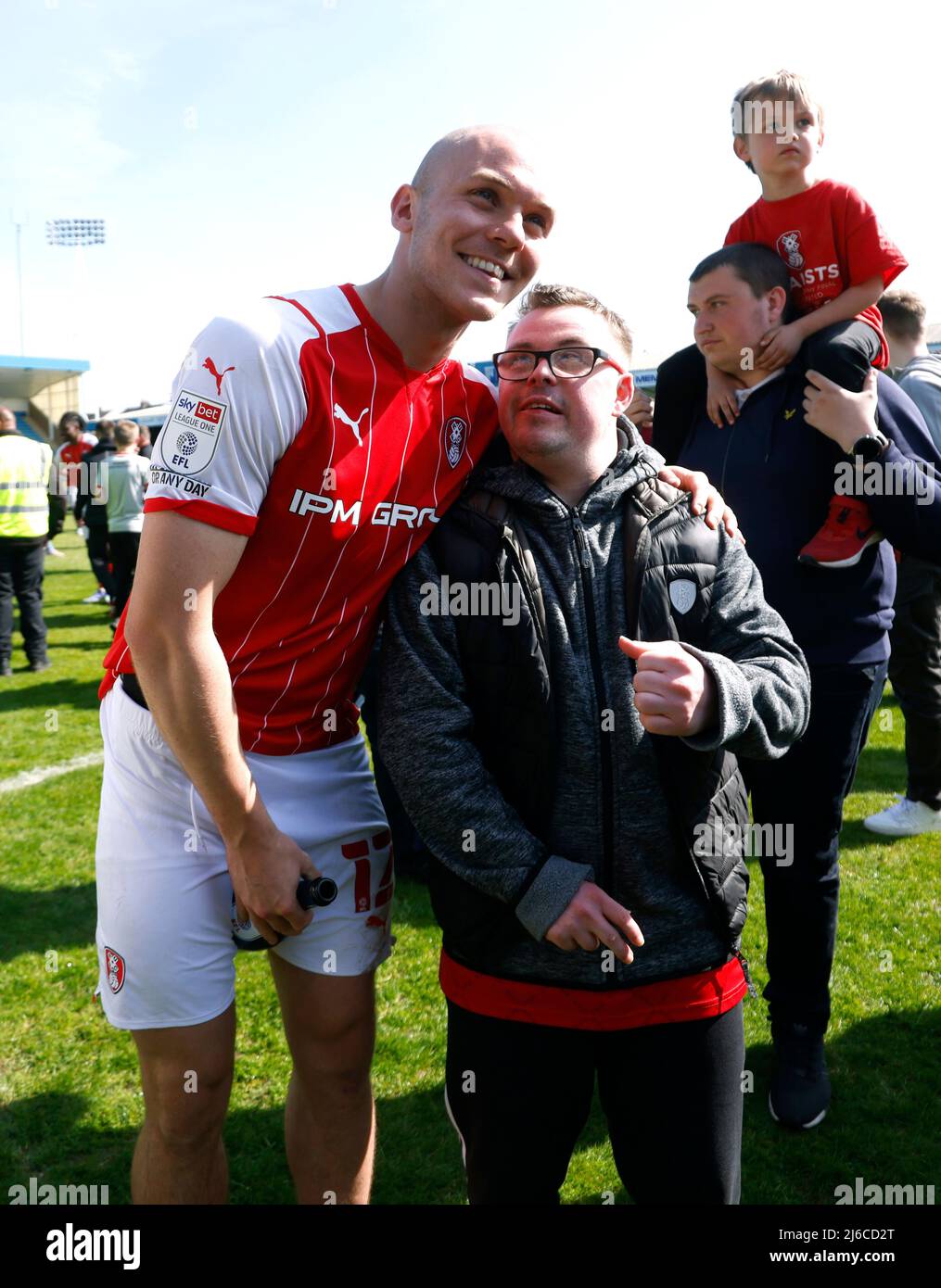 Rotherham United's Georgie Kelly poses for a photo with a fan after the ...