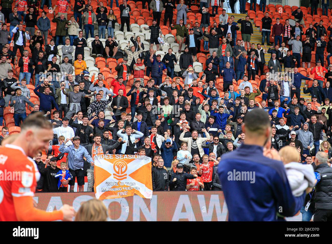 Blackpool fans celebrate during the teams walkabout at the end of the ...