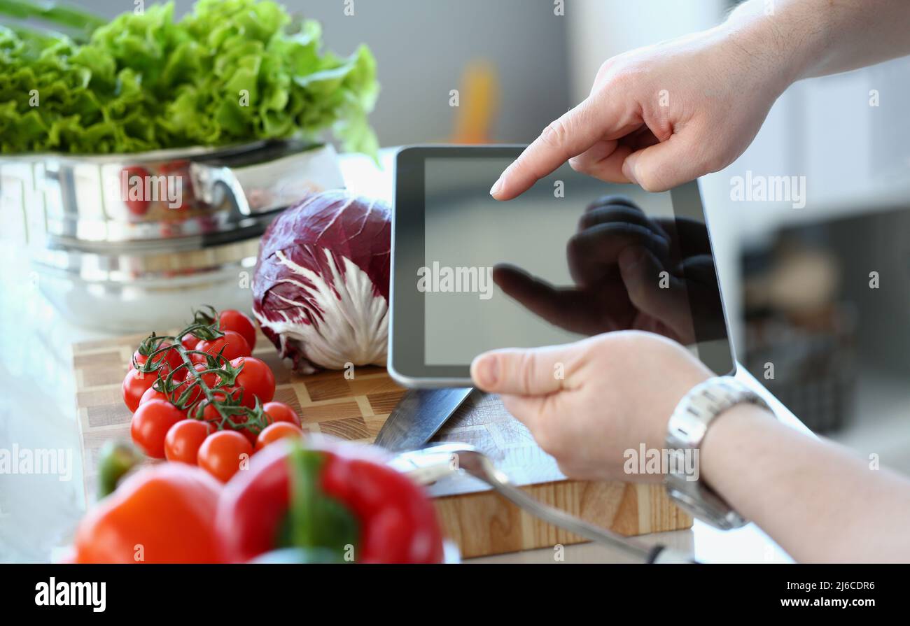 Vlogger chef showing ripe vegetables ingredients, video for culinary ...
