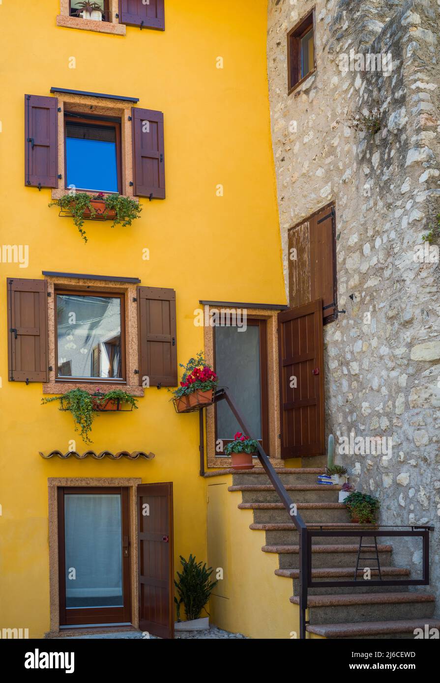 Malcesine, italy, a traditional colorful house at the base of the ...