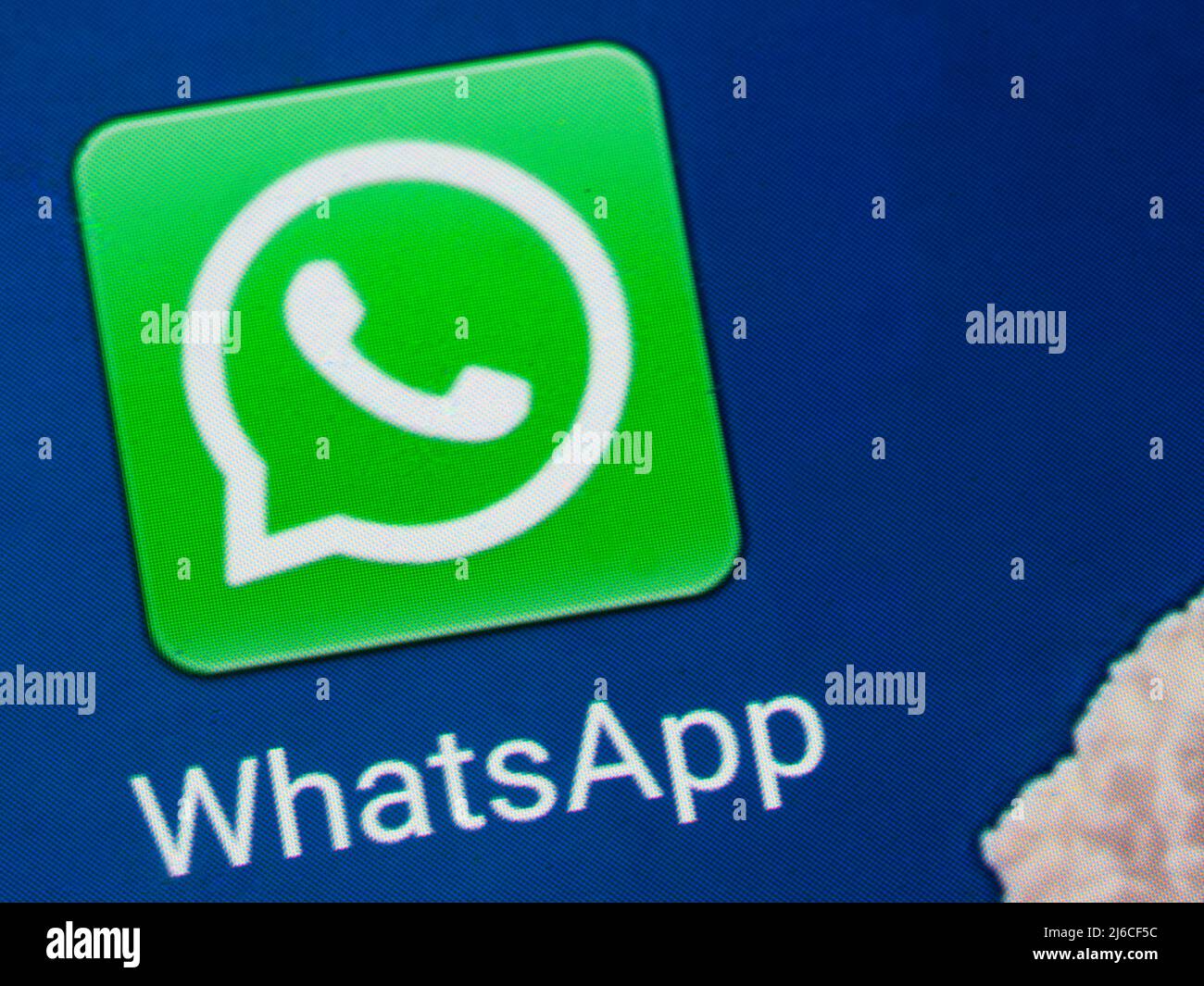 In this photo illustration, the WhatsApp logo is displayed on a ...