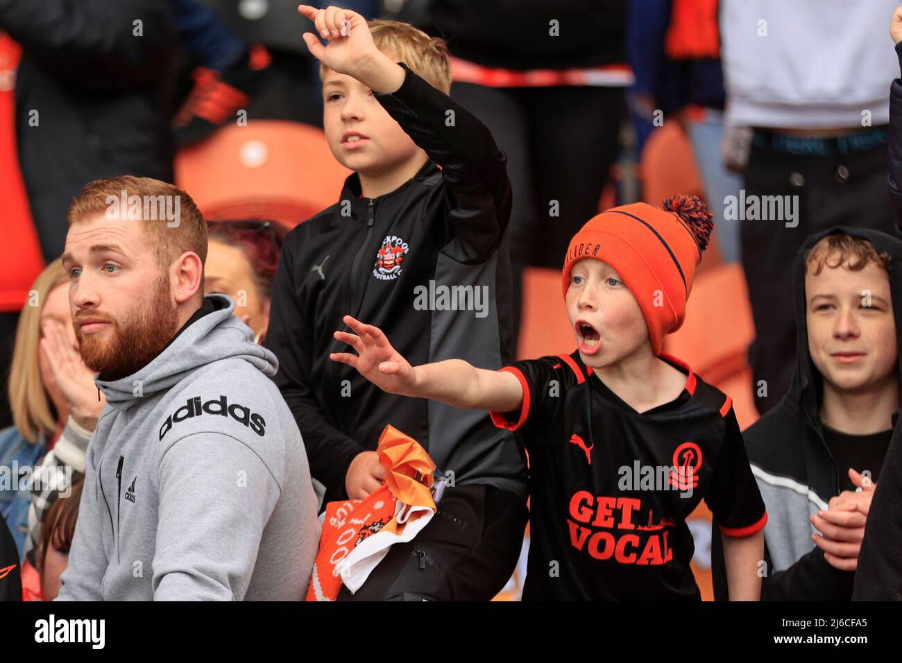 Young Blackpool fans cheer on their team Stock Photo - Alamy