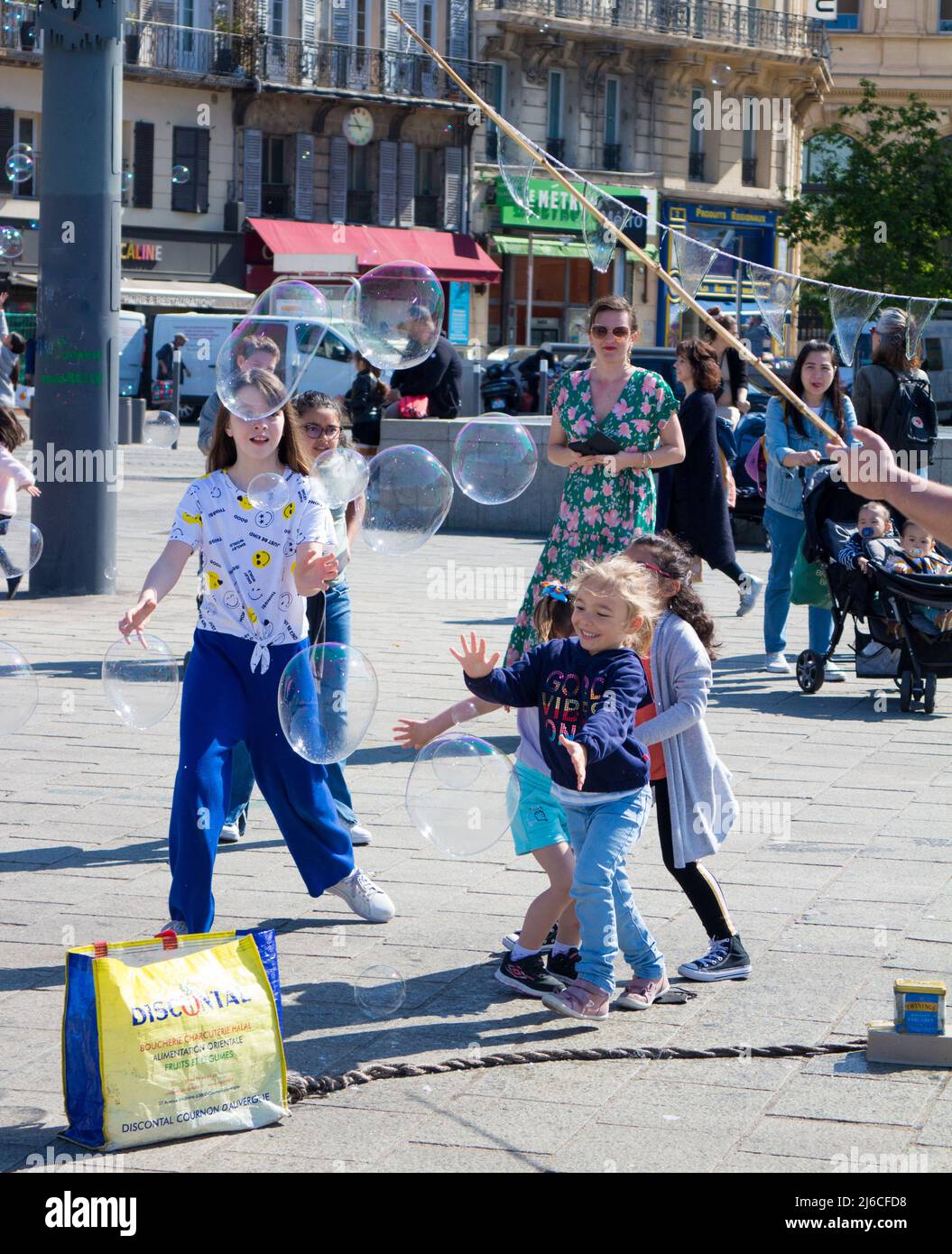 Children playing with soap bubbles Stock Photo - Alamy