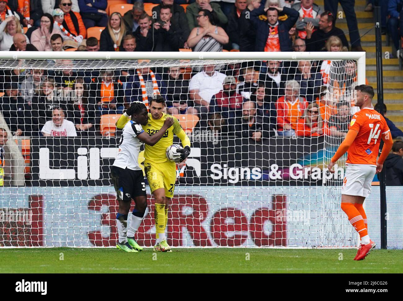 Derby County goalkeeper Kelle Roos is congratulated by his team mates ...