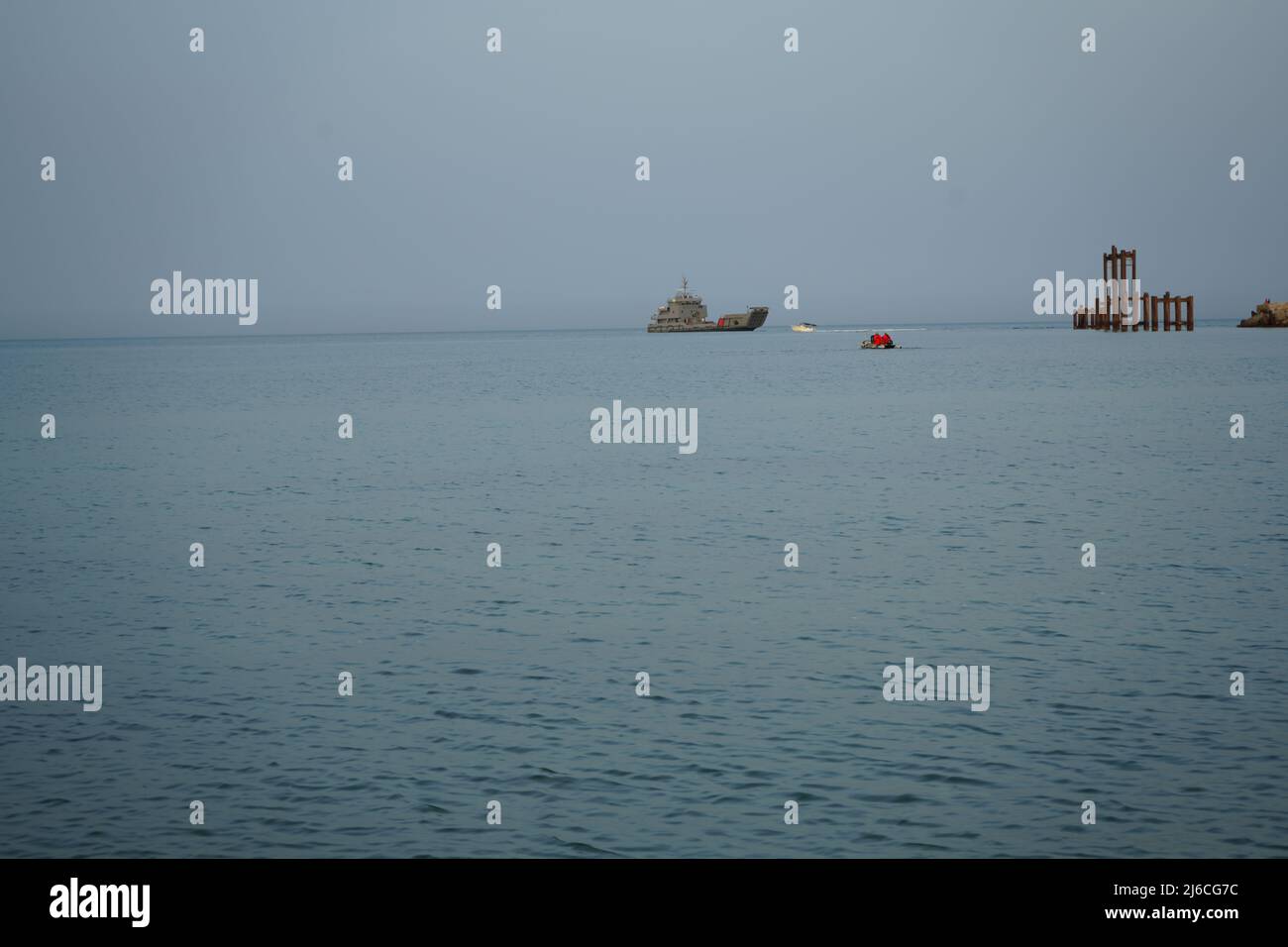 The toys of the adult humans. Ship and boats in the Coast line Stock ...