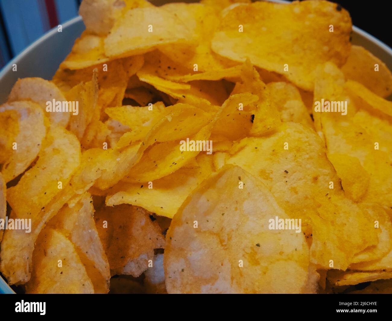 A bowl of potato chips. A close-up shot Stock Photo - Alamy