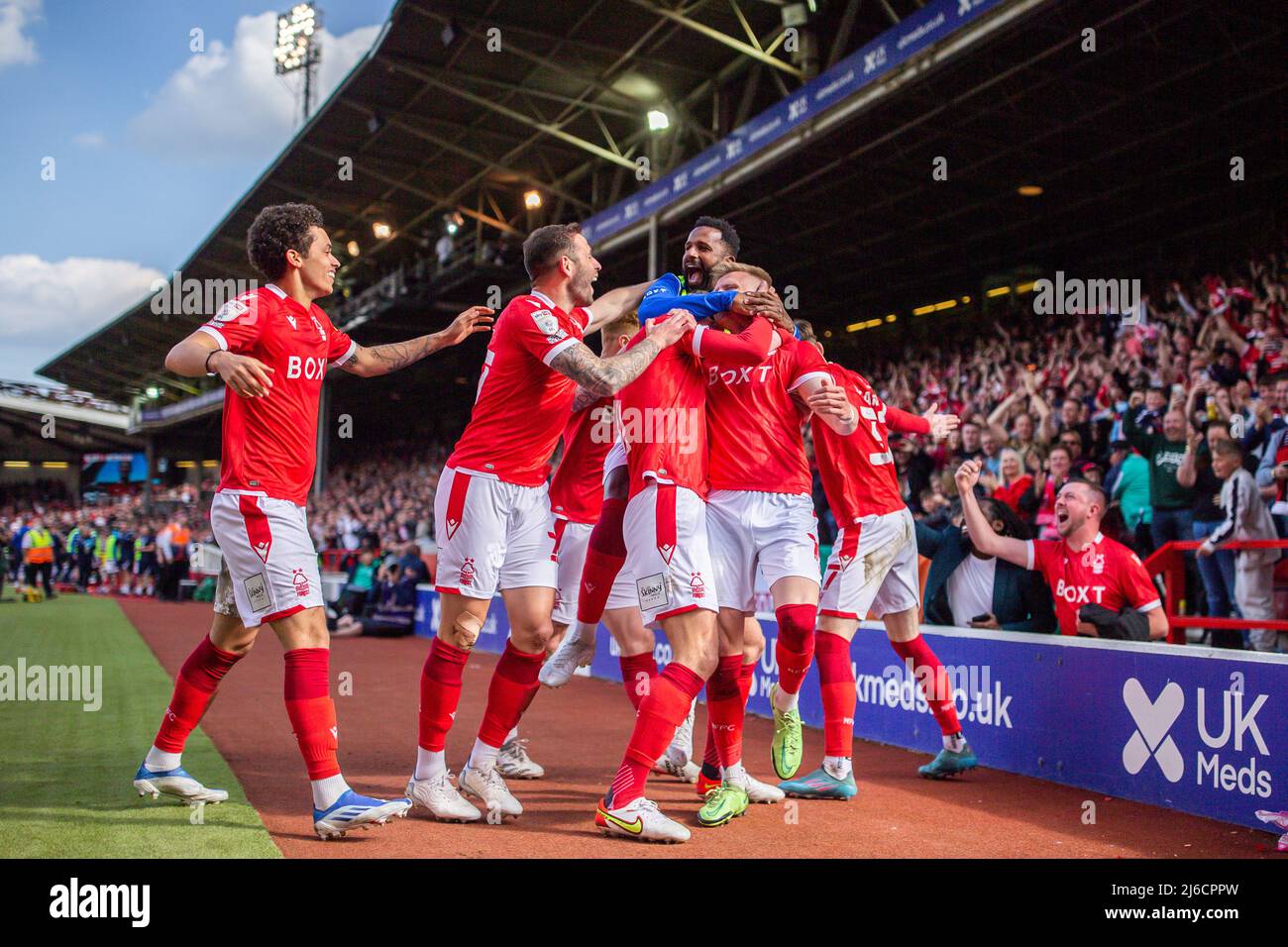 Sam Surridge #16 of Nottingham Forest is mobbed by team mates after ...