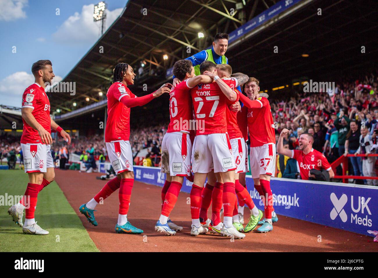 Sam Surridge #16 of Nottingham Forest is mobbed by team mates after ...