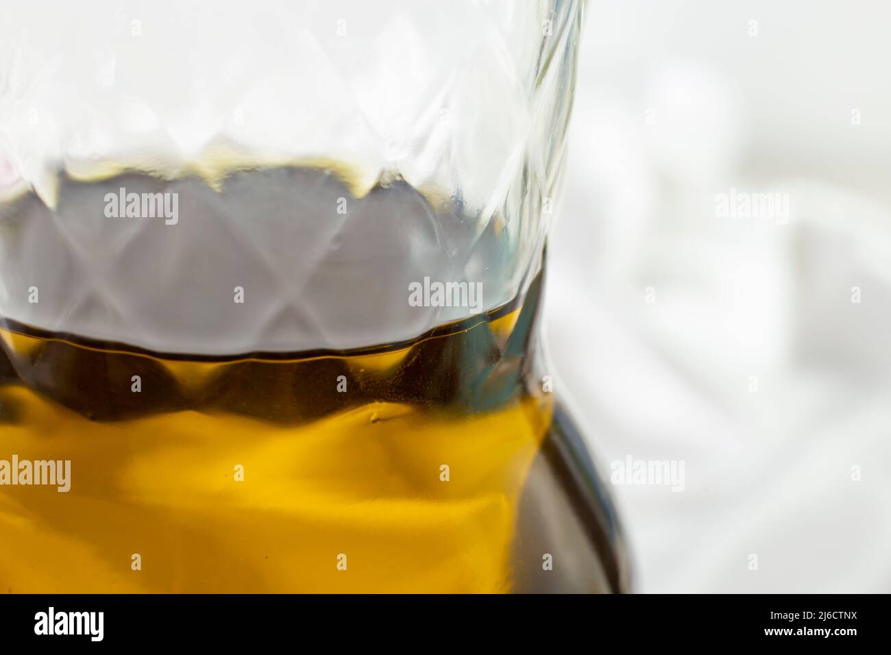 partialy defocused, textured glass bottle neck with olive oil Stock ...