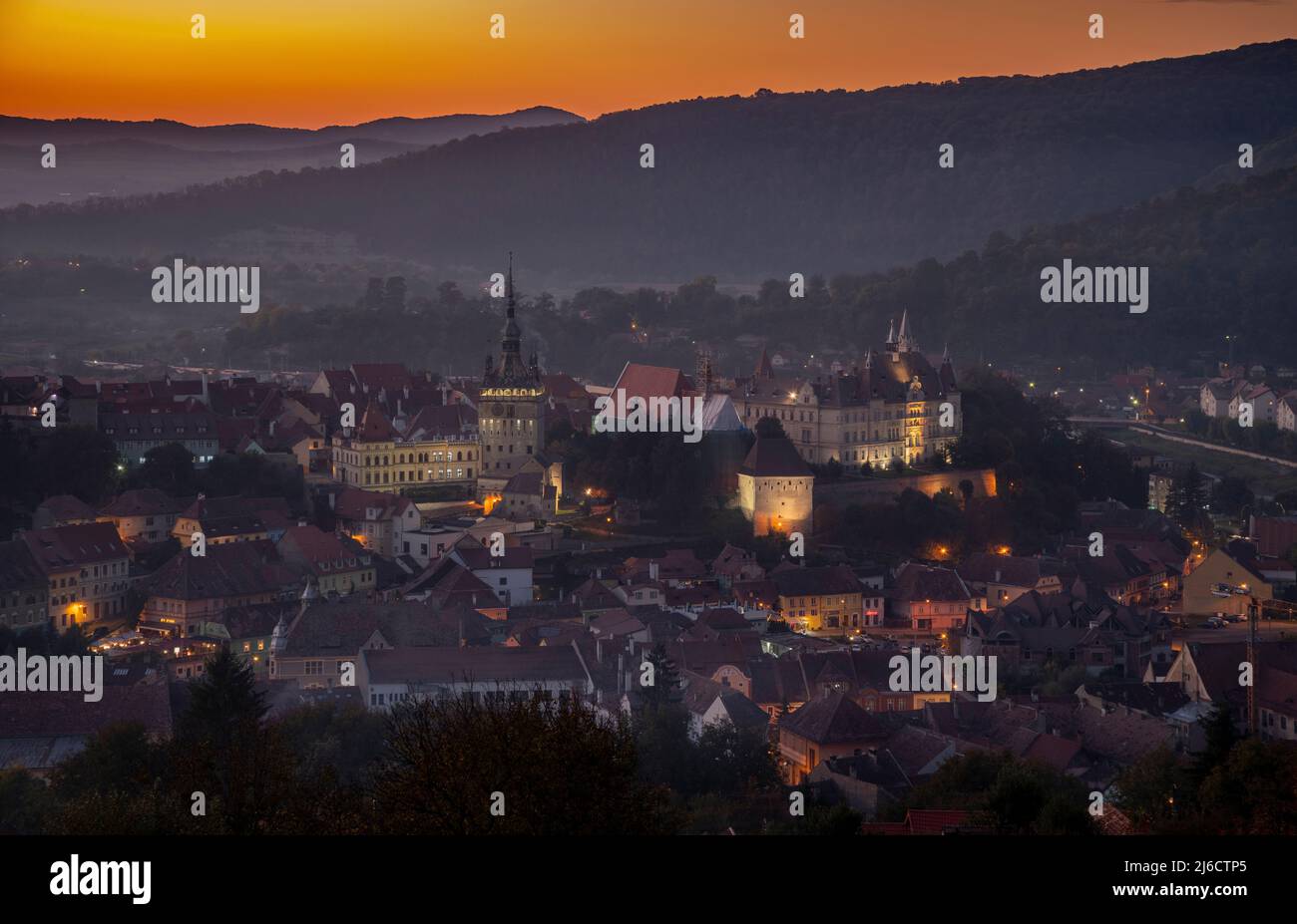 The medieval saxon transylvanian city of Sighișoara, in the evening ...