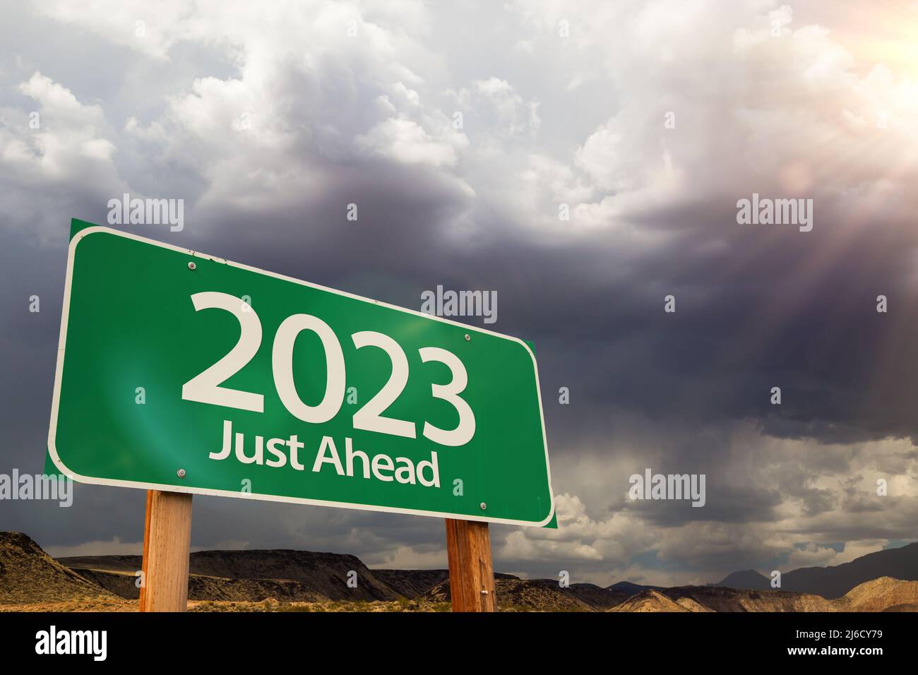 2023 Green Road Sign Over Dramatic Clouds and Sky Stock Photo - Alamy