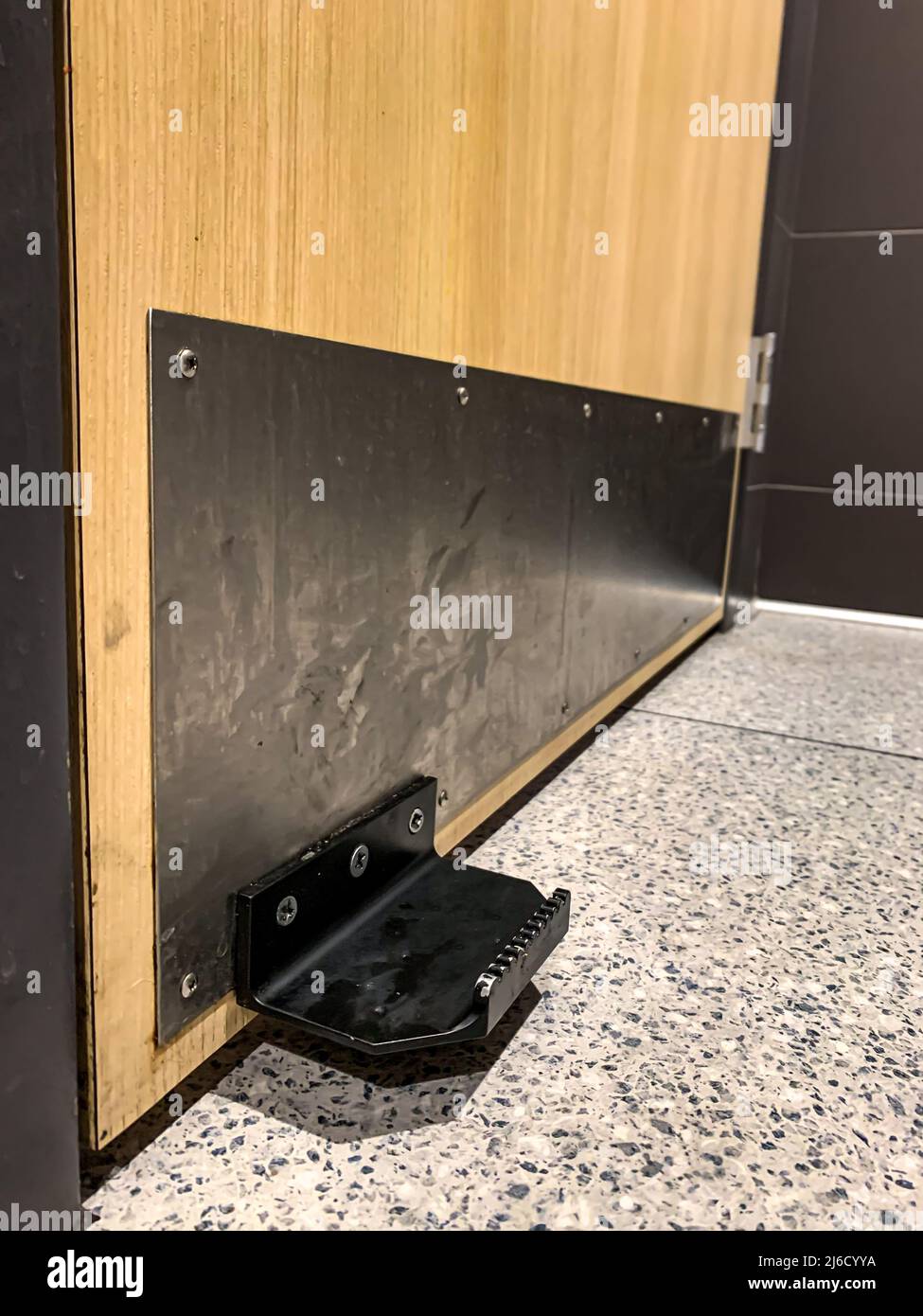 Hands free door opener that can be used to exit a room without ...