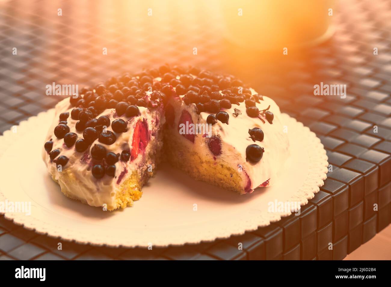 Strawberry cream cake served on the terrace table. High quality photo ...