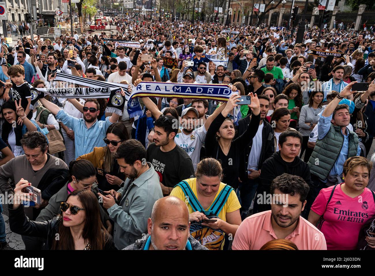 A large crowd of Real Madrid fans celebrating in Plaza de Cibeles the ...