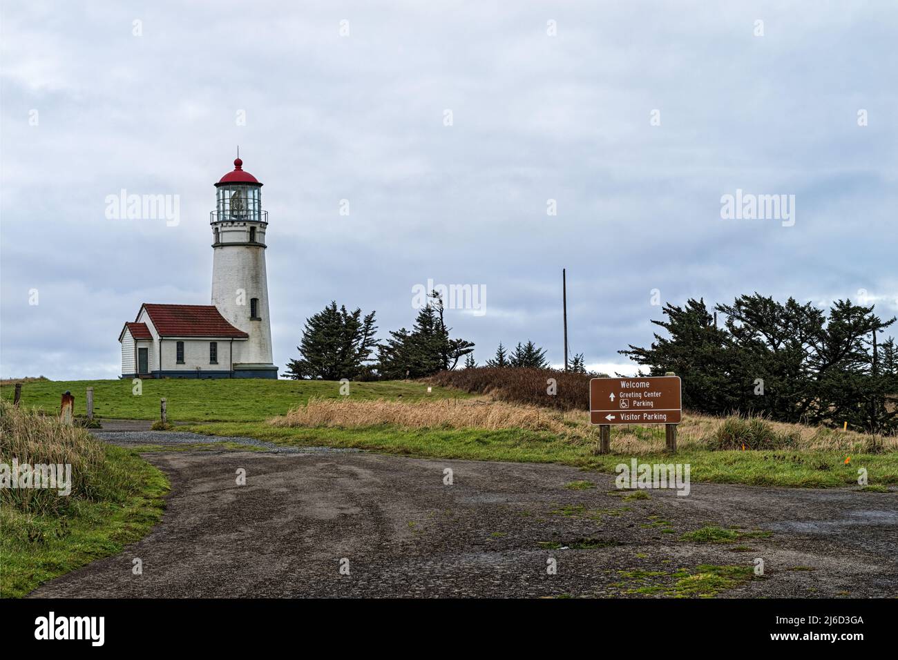 Signs welcome visitors to the lighthouse at Cape Blanco State Park in ...